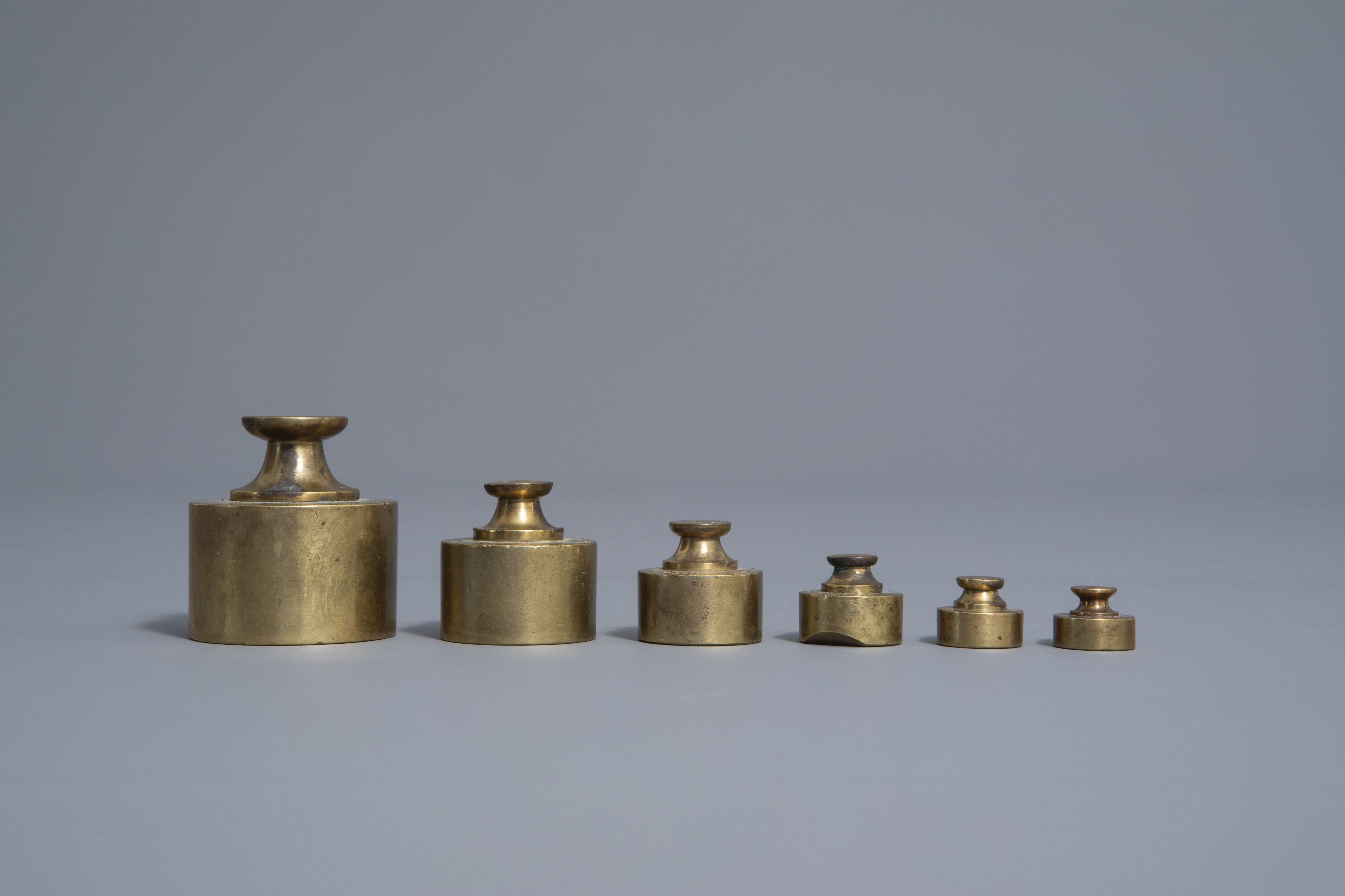 A French nine-piece set of copper bank weights for gold coins, 19th C ...